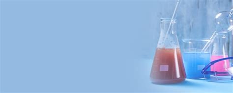 Premium Photo Science Glassware With Colored Liquid Glasses Mask Gloves