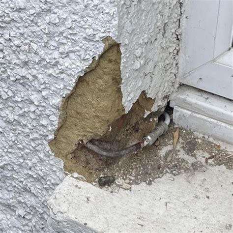 I Had To Remove A Part Of This Pebble Dash” Render To Access A Hidden
