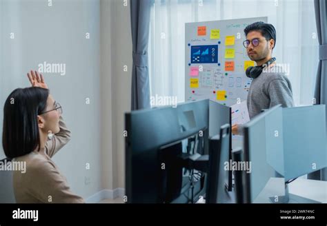 Developer Ask Question To Team Present Project Interface Design With