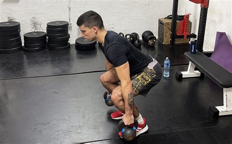 Suitcase Squat Exercise Guide Muscles Worked Benefits Alternatives