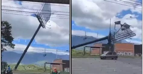 Video Valla publicitaria cayó sobre un vehículo milagrosamente no