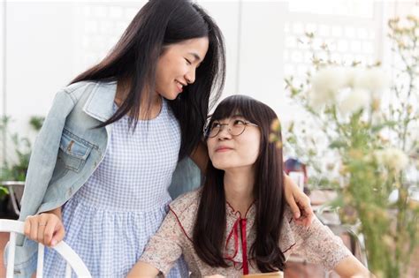 Premium Photo Two Asian Girl Teen Love Together Look At Each Other
