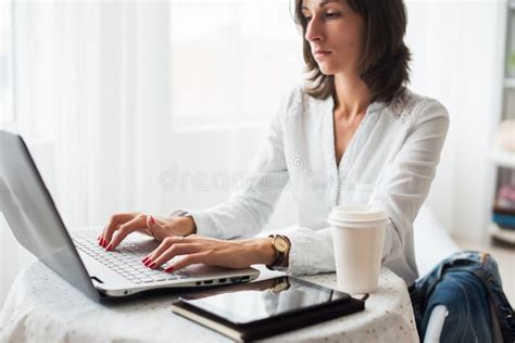 Freelancer Using Notebook Woman Working On Laptop Stock Photo Image