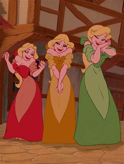 Three Women In Dresses Standing Next To Each Other