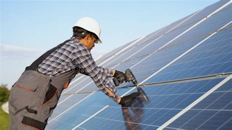 Indian Engineer Working Setup Solar Panel At Station Stock Video