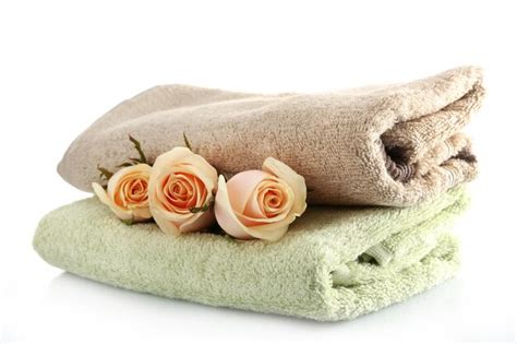 Premium Photo Stack Of Colorful Towels Isolated On White