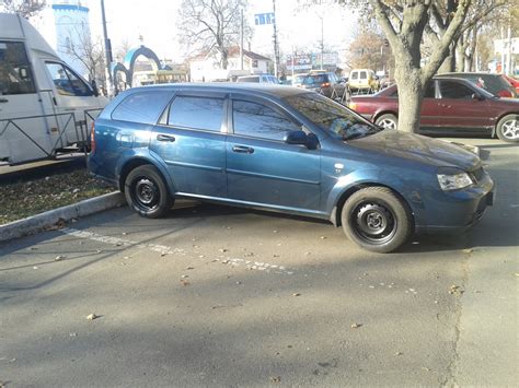 Облагородил на зиму зашарпаные колпаки — Chevrolet Lacetti SW, 1,8 л ...