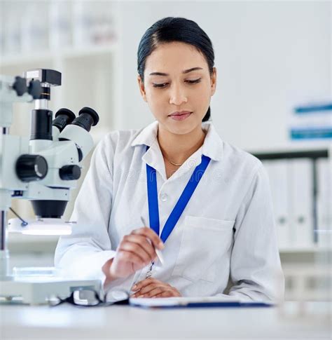 Woman Notebook And Microscope For Research In Laboratory For Medical Development And Clinic