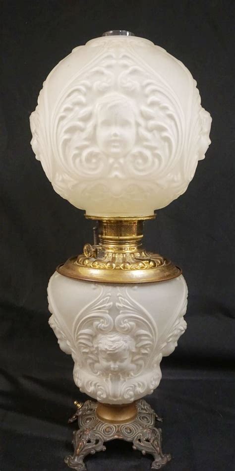 Satin Glass Cherub Faced Gwtw Lamp Auction