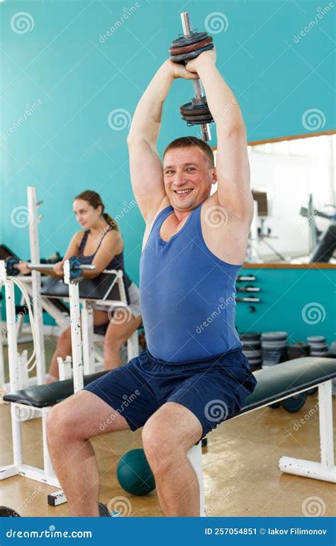 Positive Man Doing Exercises With Dumbbells Stock Image Image Of Club