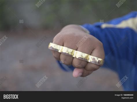 Hand Man Wearing Brass Knuckles Image And Photo Bigstock