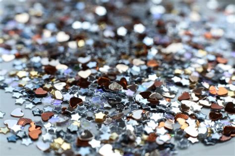 Premium Photo Many Small Shiny Sequins On A White Background