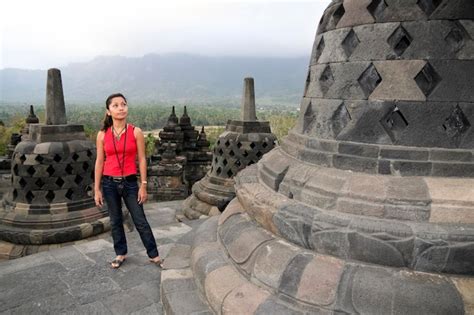 Premium Photo Woman Standing At Borobudur Temple