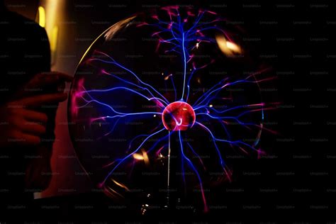Plasma Ball With Energy Rays On Dark Background Physic Model Of Plasma