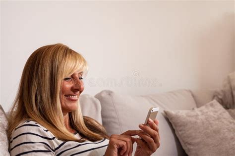 Woman Texting On The Sofa Stock Image Image Of Portrait 57592983