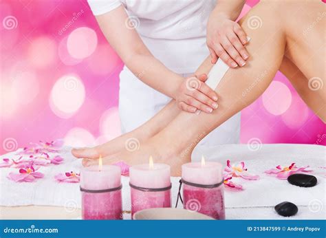 Beautician Waxing Woman Leg With Wax Strip Stock Image Image Of