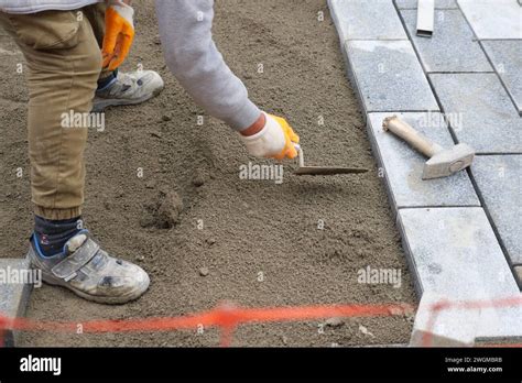 Laying Concrete Bricks On Each Other For Building A New Sidewalk In Istanbul Stock Photo Alamy