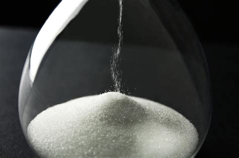 Premium Photo Hourglass On Dark Background