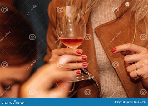 Glass Of Rose Wine Tasting With Friends And Wine Lovers Stock Image