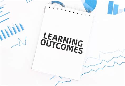 Premium Photo White Notepad With Text Learning Outcomes On The Financial Documentation Finance