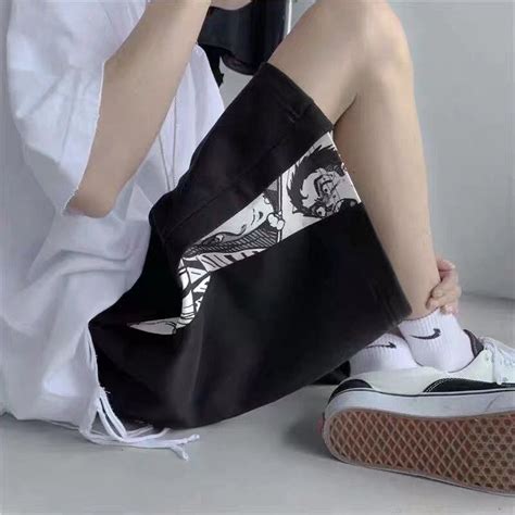 กางเกงขาสั้2565 กางเกงขาสั้นกีฬาแบบสบาย ๆ รุ่นเกาหลีรุ่นใหม่ของฤดูร้อนหลวมและกางเกงขายาวสวม