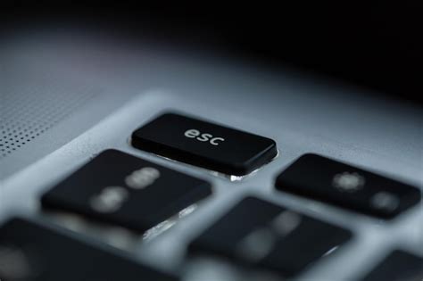 Premium Photo Computer Keyboard With Focus On The Esc Button Macro