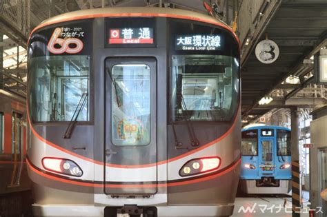 Jr西日本323系に大阪環状線60周年ロゴマークなど 装飾作業を公開 マイナビニュース