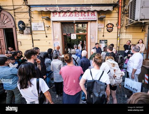 A Crowd Of People Wait For A Table At Pizzeria Da Michele Made Famous