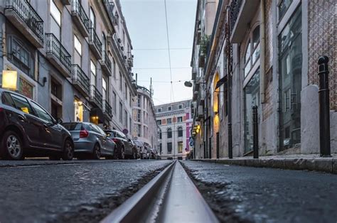 Premium Photo Surface Level Of Street Amidst Buildings In City