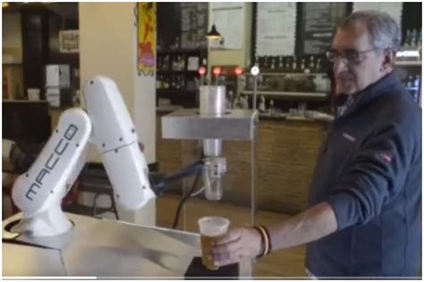 Watch Robotic Bartender Serves Beer To Customers In Seville As Pubs