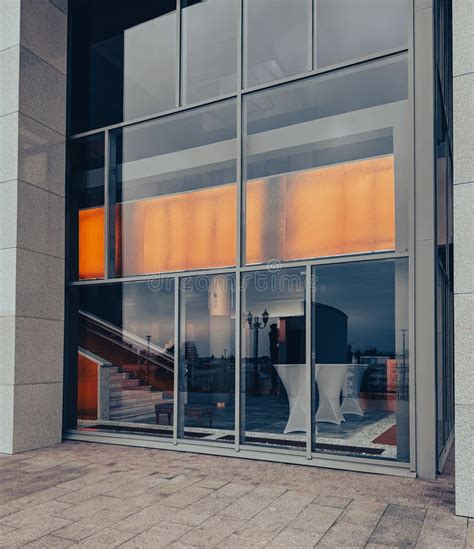 Abstract Background Of Glass On The Windows In A Building In Orange