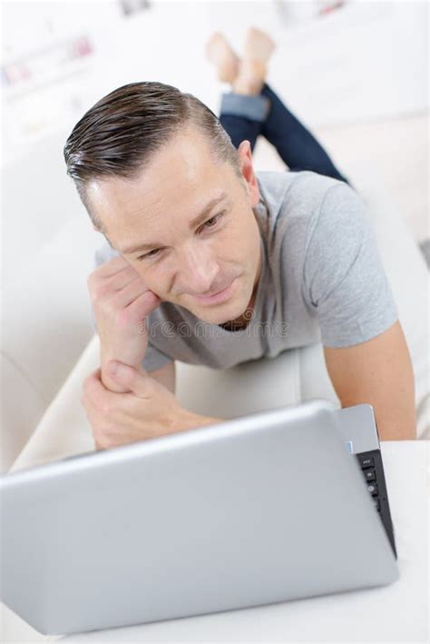 Man Looking At Computer At Home Stock Photo Image Of Communication Smiling 278505988