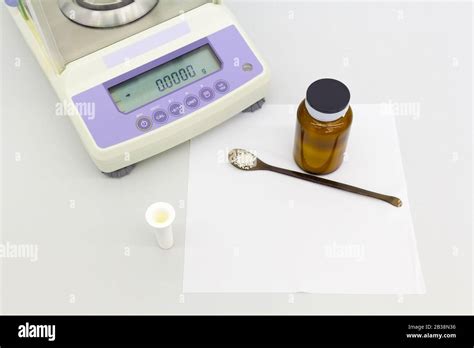 Laboratory Scale On Table With Materials In Bottles Stock Photo Alamy