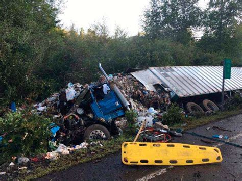 Tractor Trailer Crash Spills Garbage Onto Highway 101 Near Brinnon