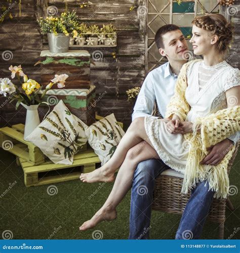 Concept Of Happiness Is A Happy Wife Sitting On The Lap Of Her Husband Stock Image Image Of