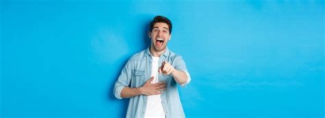 Free Photo Adult Man In Casual Outfit Laughing Out Loud And Pointing