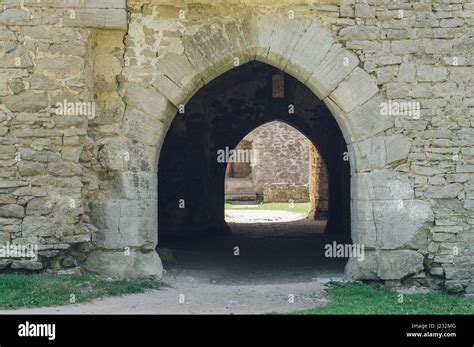 Ancient Arch Doorway Leading Through Passage Of Medieval Castle Stock