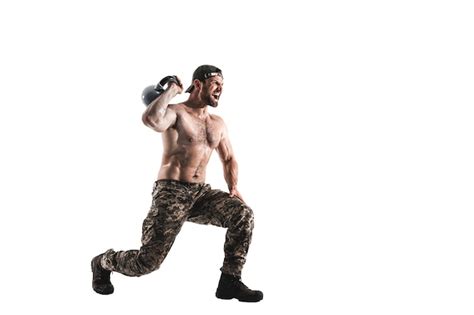 Premium Photo Muscular Athlete Bodybuilder Man In Camouflage Pants