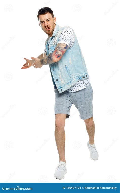 The Man Screams Aggressive Guy In Tattoos Yelling At The Frame And