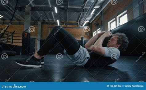 Energetic Fighter Warming Up In Fitness Center Kickboxer Making Hits