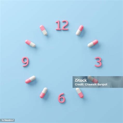 캡슐 알약은 시계 얼굴을 형성합니다 상단 또는 전면 보기 밝은 파란색 배경입니다 건강 관리는 수면제 약국 보충제 또는 비타민을 복용하면서 제 시간에 약을 복용하도록