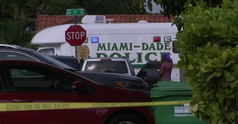 miami dade special response team shot at while executing warrant cbs