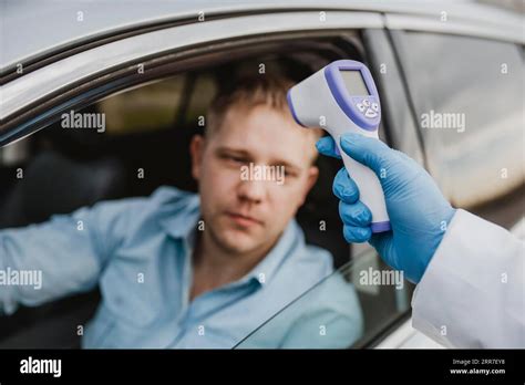Adult Male Getting His Temperature Checked Stock Photo Alamy