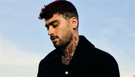 Zayn Malik Spotted Puffing On Cigarette After One Direction Comeback
