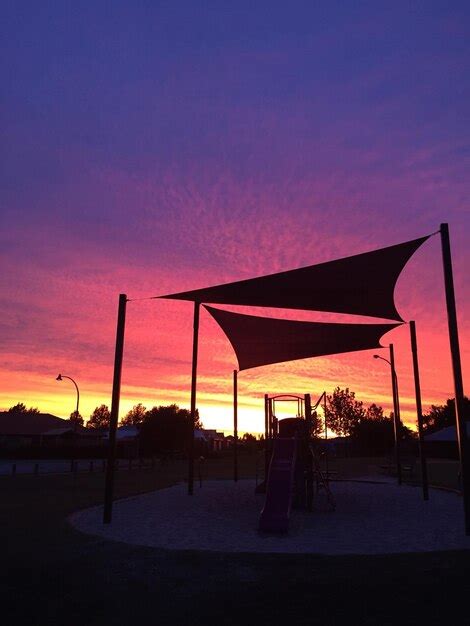 Premium Photo Silhouette Flag Against Sky At Sunset