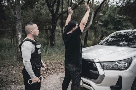 Premium Photo Police And Thief Conceptthe Cop Catch Criminals Break