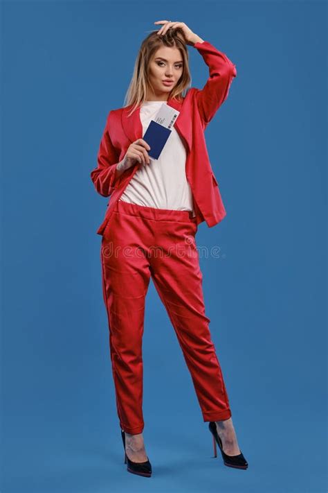 Blonde Female In White Blouse Red Pantsuit High Black Heels She