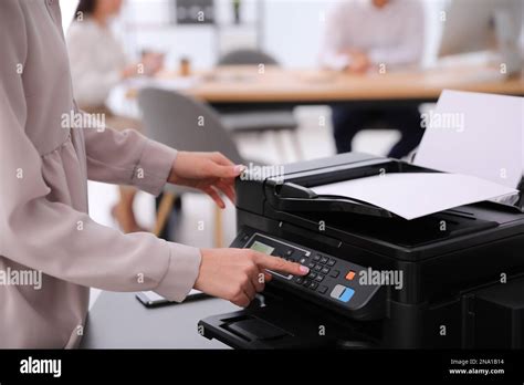 Employee Using Modern Printer In Office Closeup Stock Photo Alamy