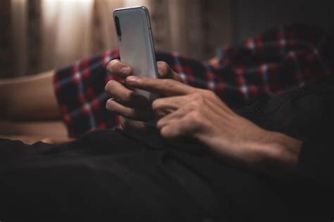 Premium Photo Guy Cheating On His Wife With Phone Calls