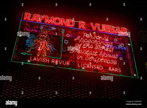 Neon Sign Advertising Striptease At The Raymond Revuebar Soho London